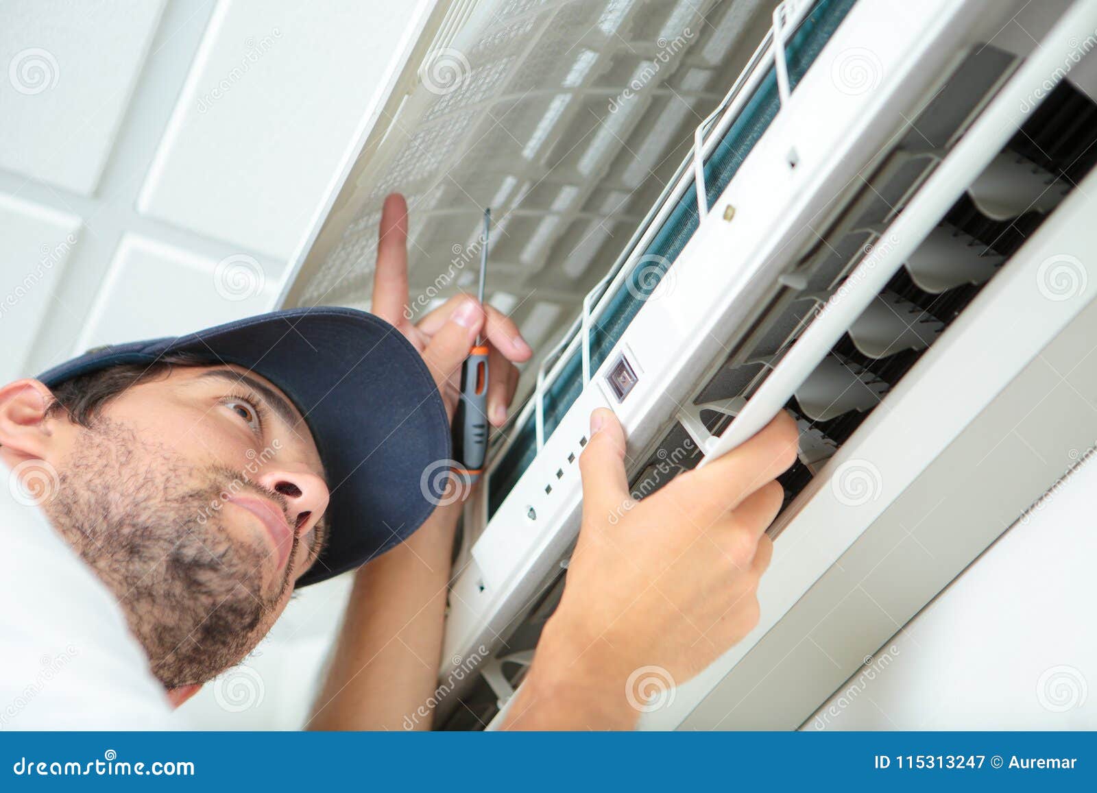 Man Working on Air Conditioning Unit Stock Image - Image of heat, home ...