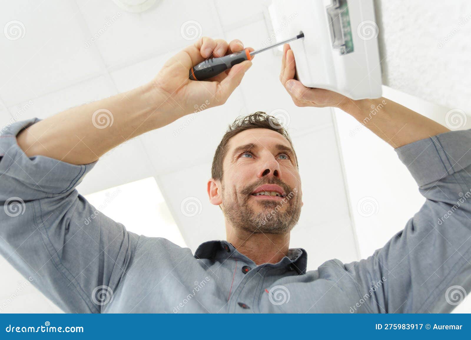 Man Working on Air Conditioning Unit Stock Image - Image of ...