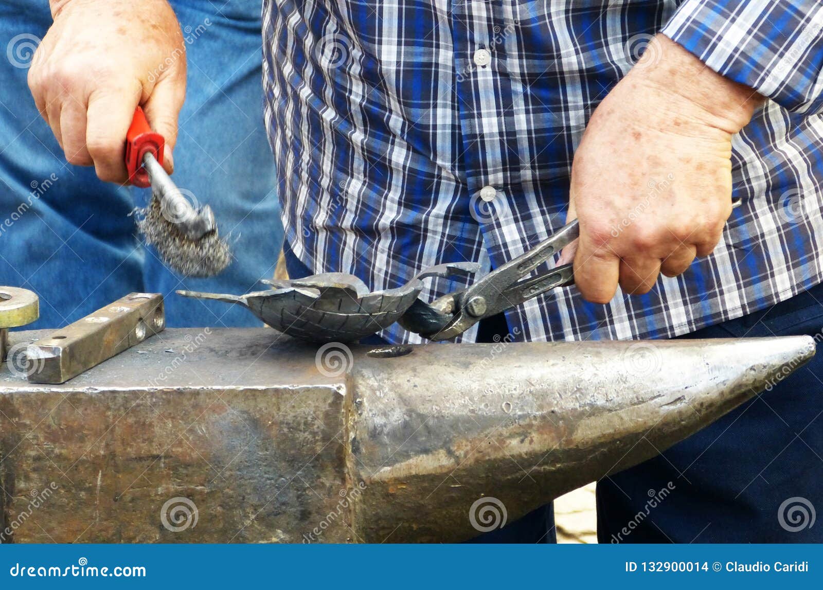 Man working on the anvil stock photo. Image of hammer - 132900014