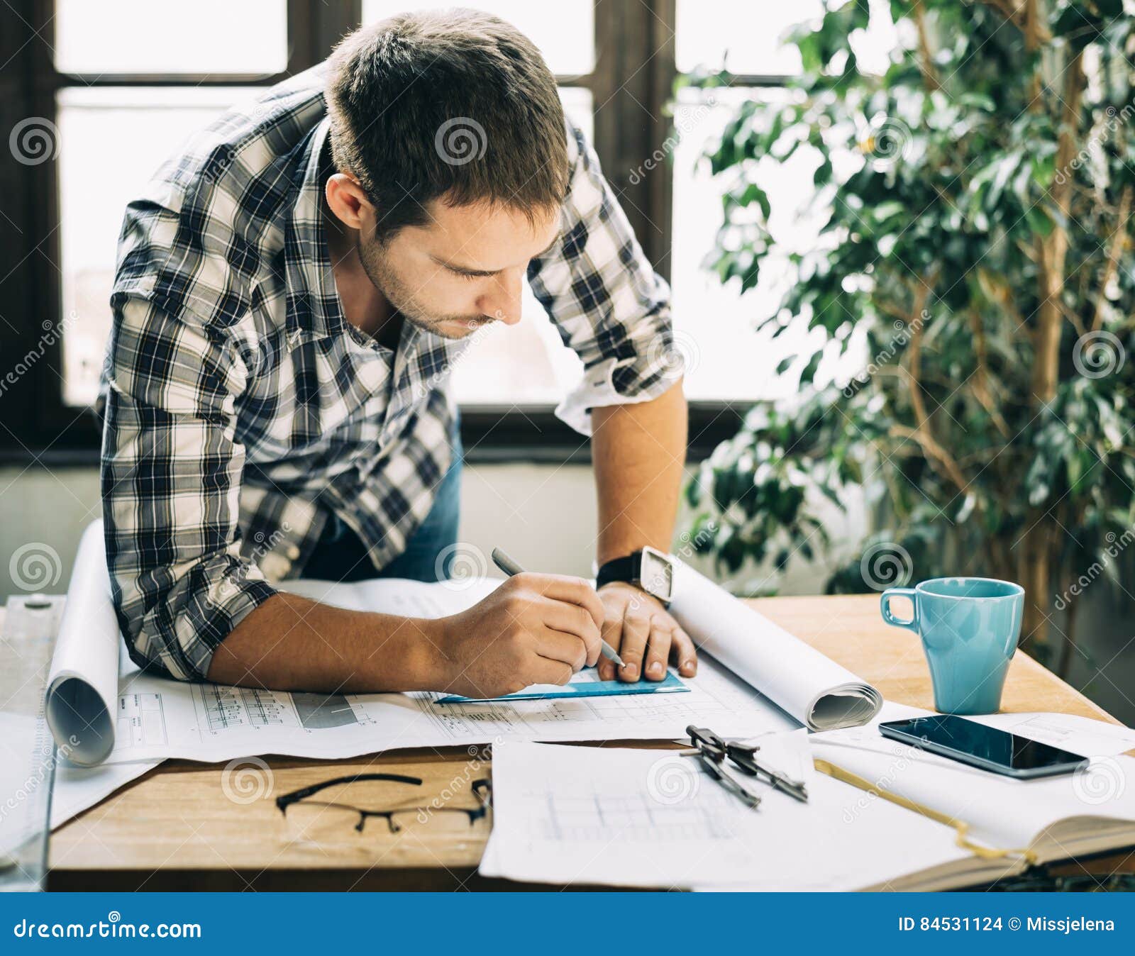 Man Working on Architectural Project Stock Photo - Image of desk ...