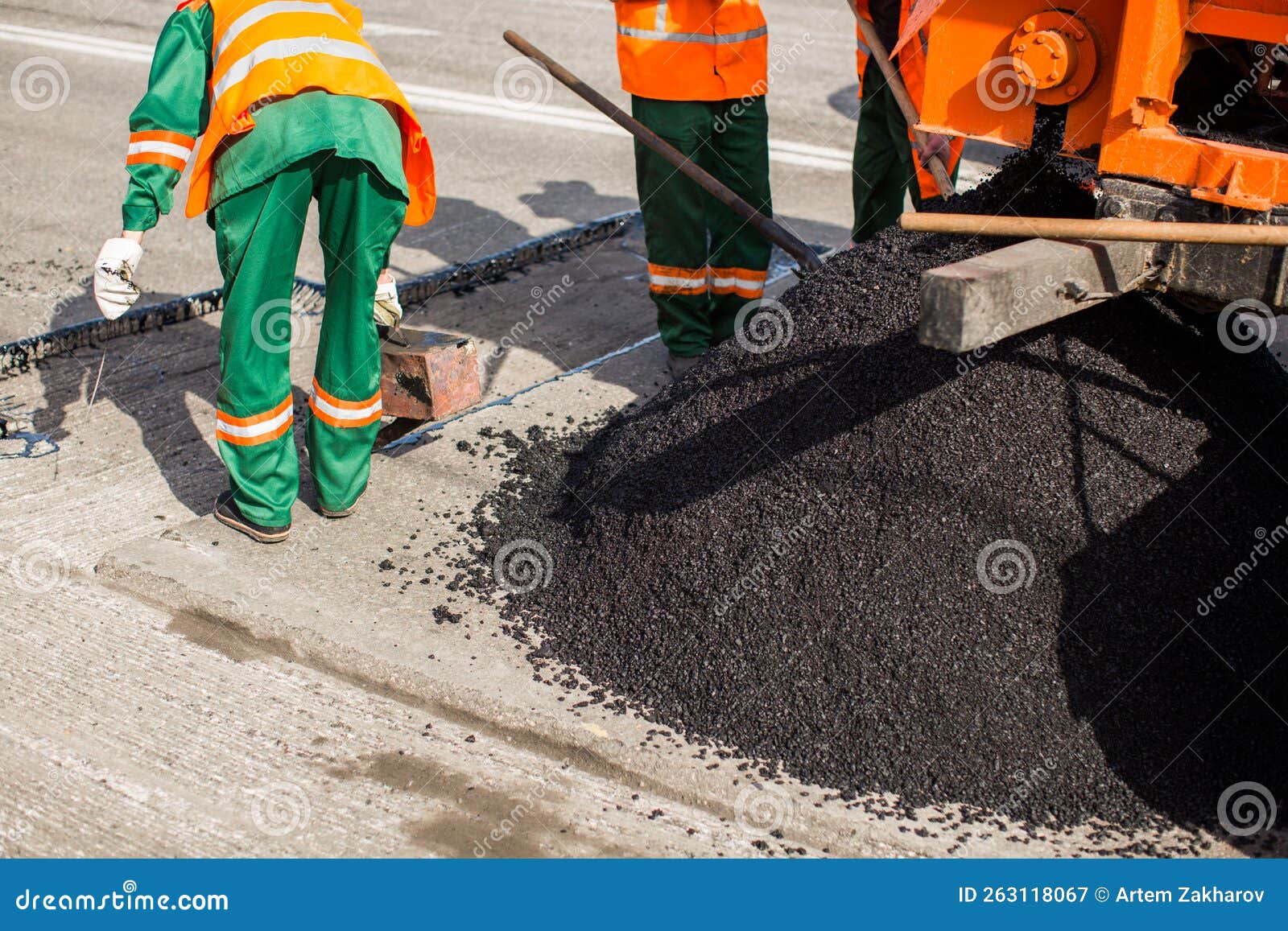 The Man Working Asphalt Pouring Tar for Road Repair. Stock Image ...