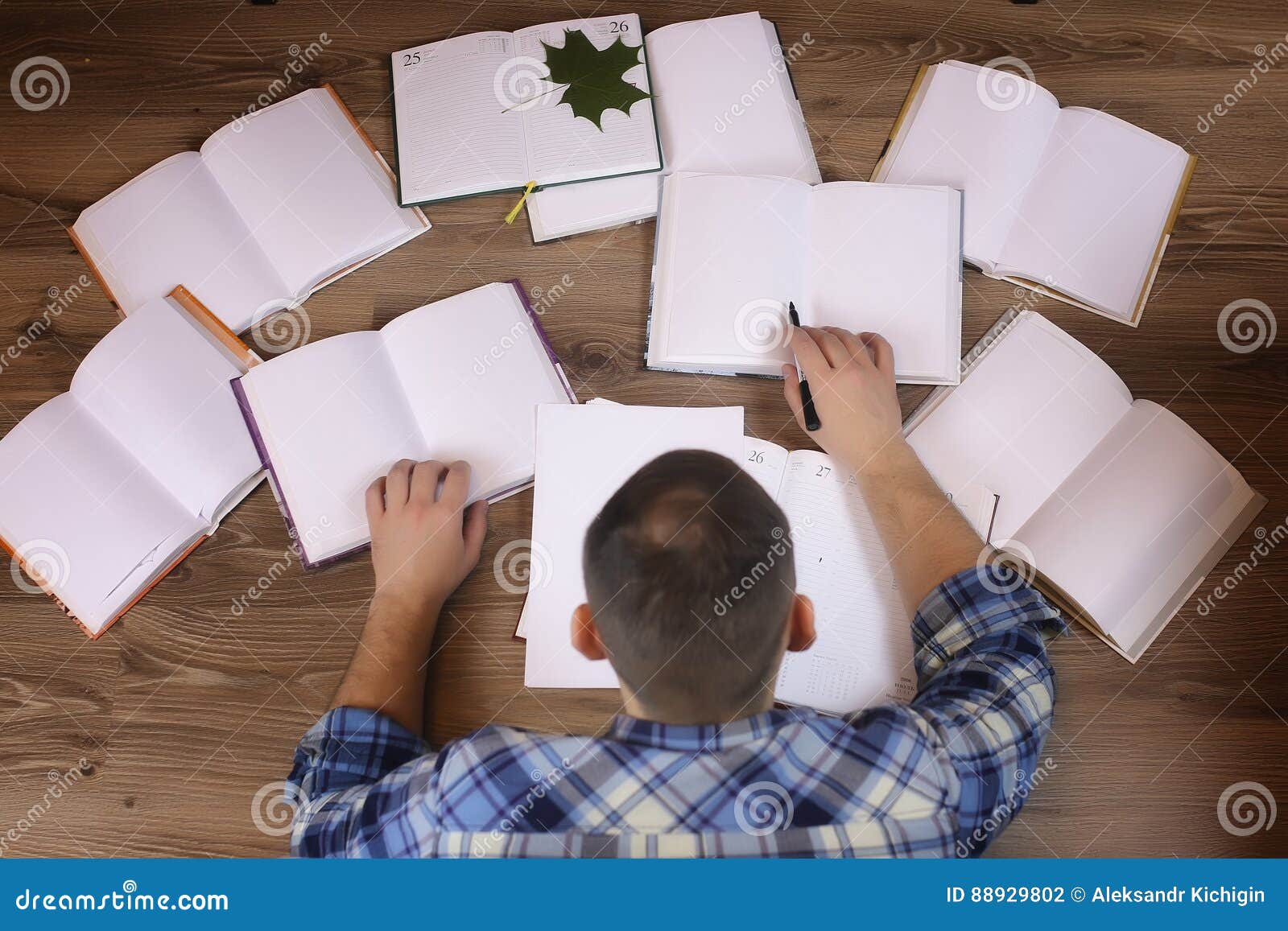 Man Working with Book on the Floor Stock Photo - Image of lifestyle ...