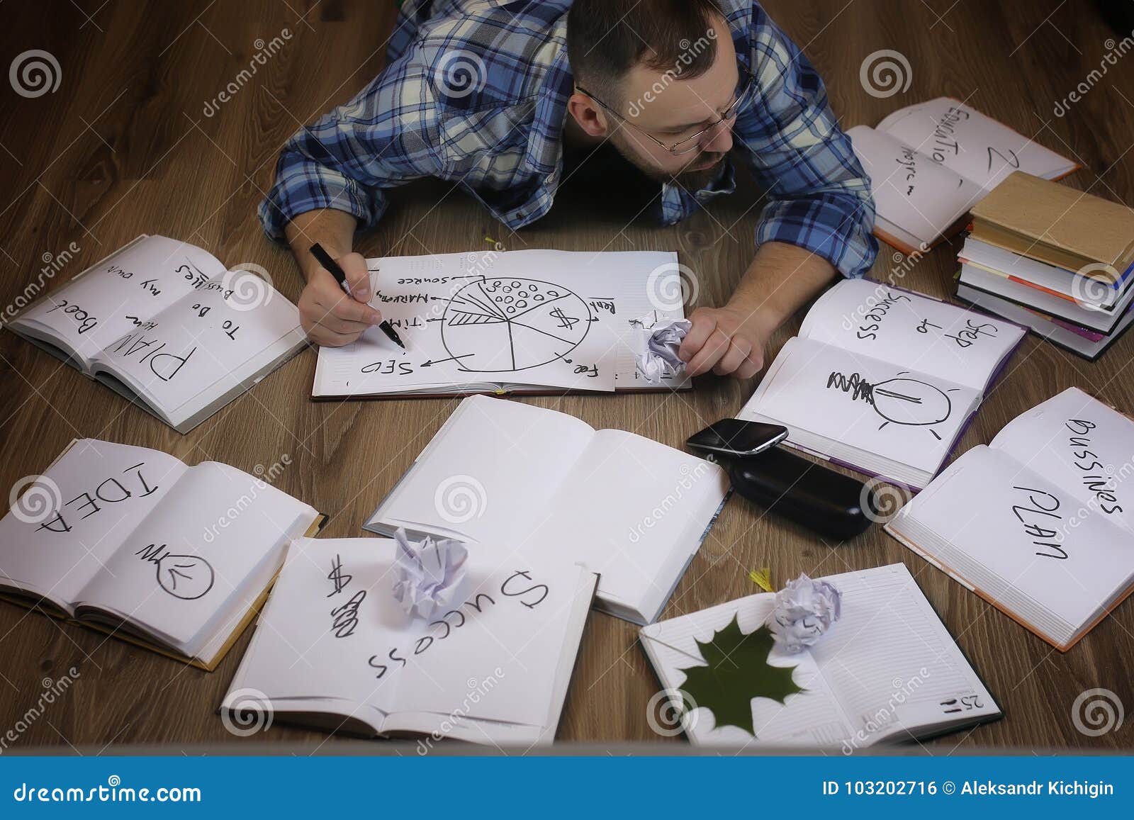 Man Working with Book on the Floor Stock Photo - Image of homework ...