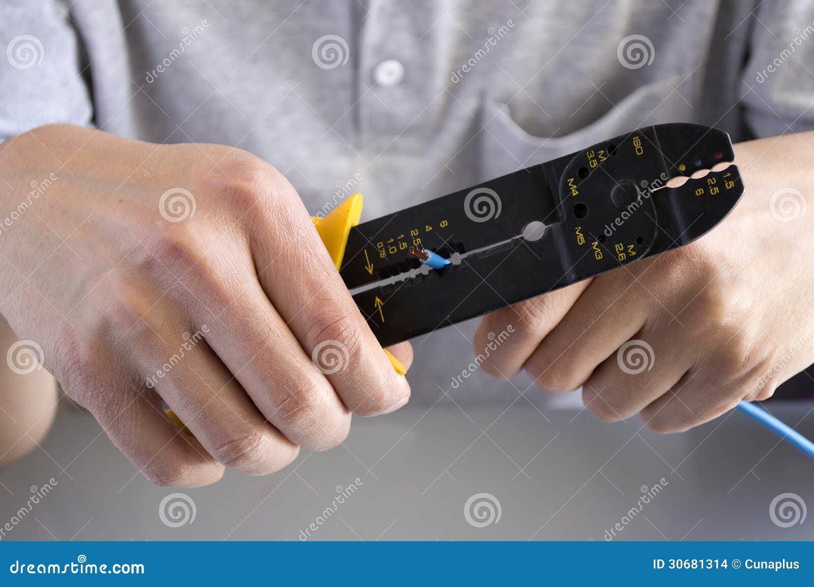 Man working cable cutting stock photo. Image of adult - 30681314