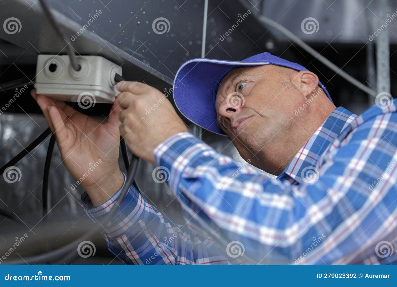 Man Working with Cables and Electrical Box Stock Photo - Image of ...