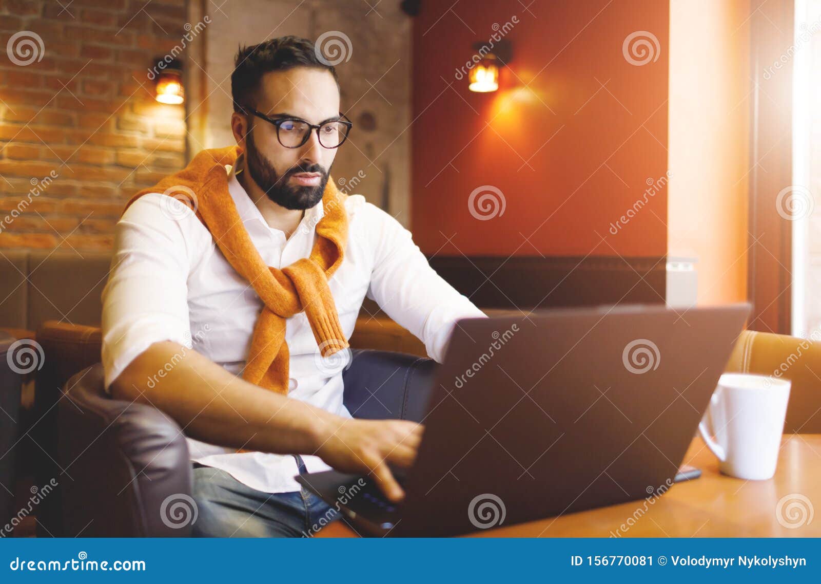 Man Working at the Cafe stock image. Image of freelance - 156770081
