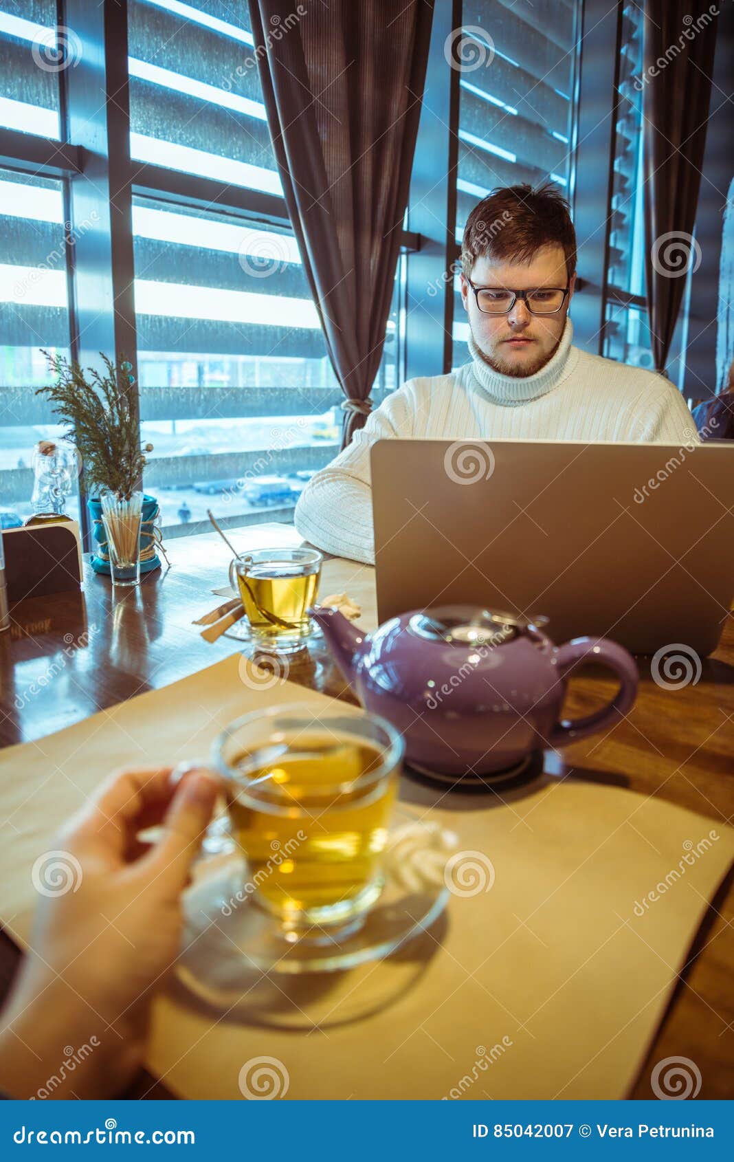Man working in cafe stock image. Image of coffeeshop - 85042007