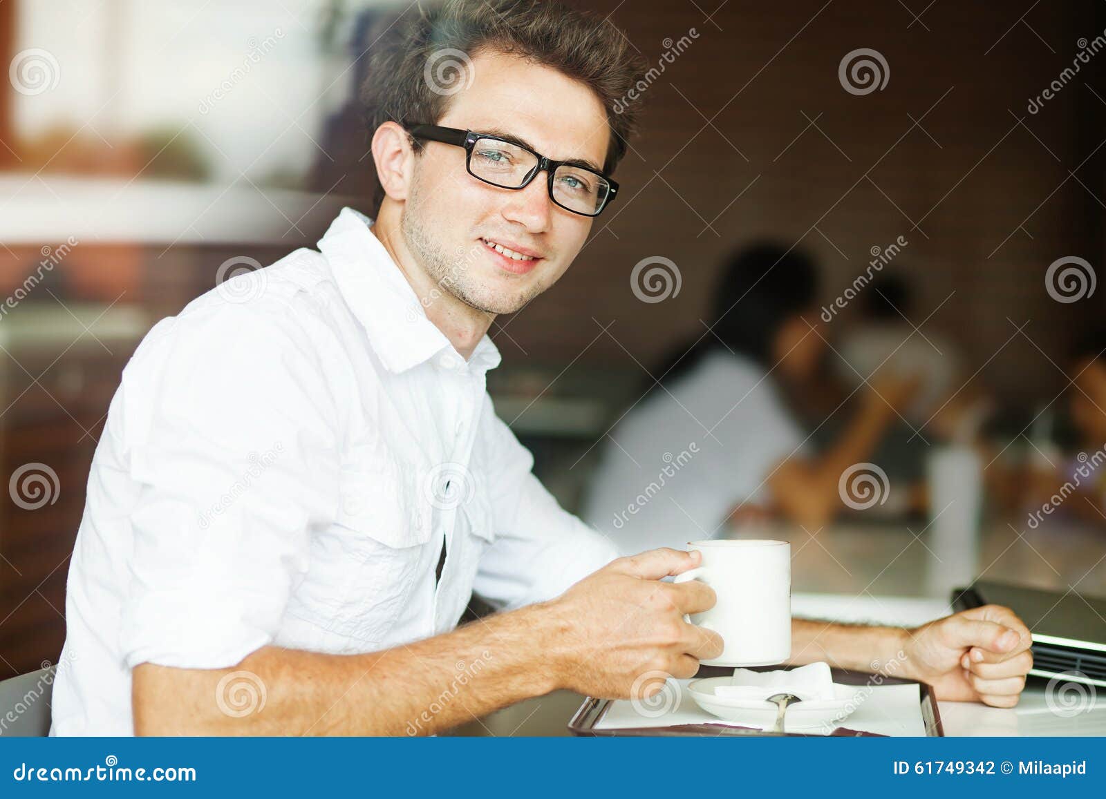 Man working in cafe stock photo. Image of adult, male - 61749342