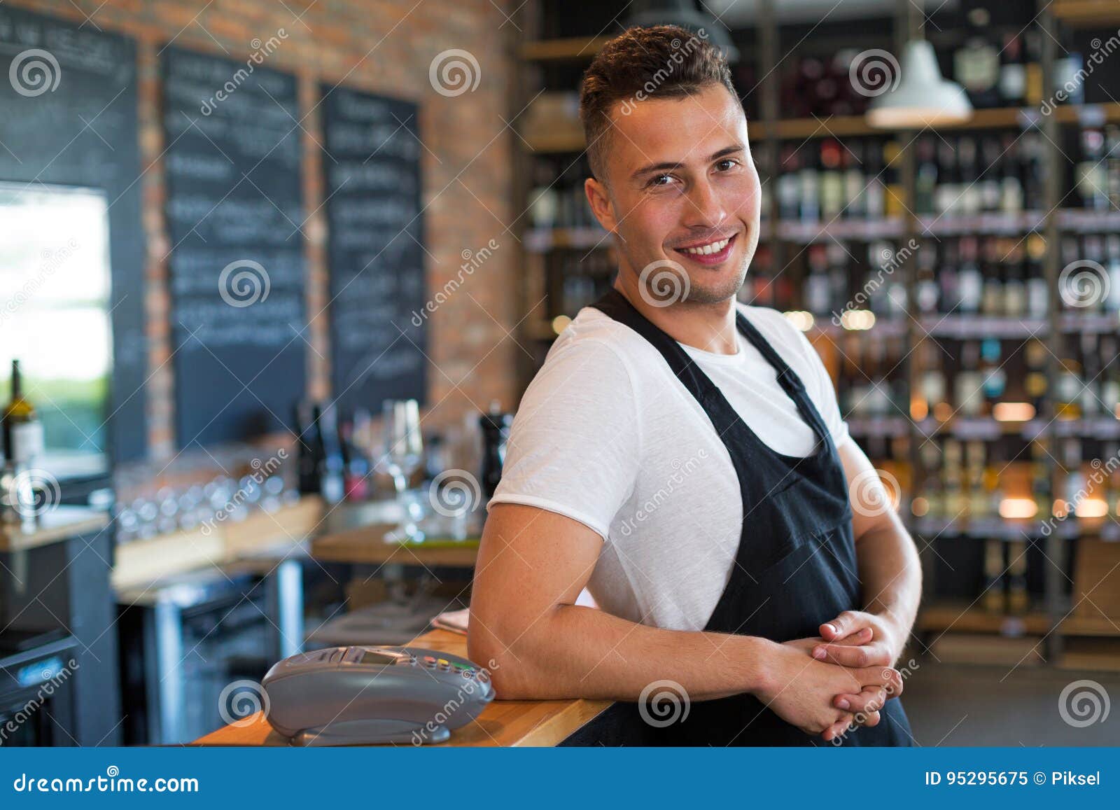 Man working at cafe stock image. Image of service, employee - 95295675