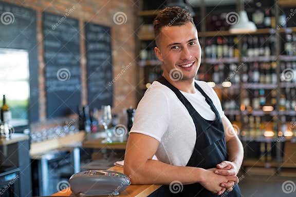 Man working at cafe stock image. Image of service, employee - 95295675