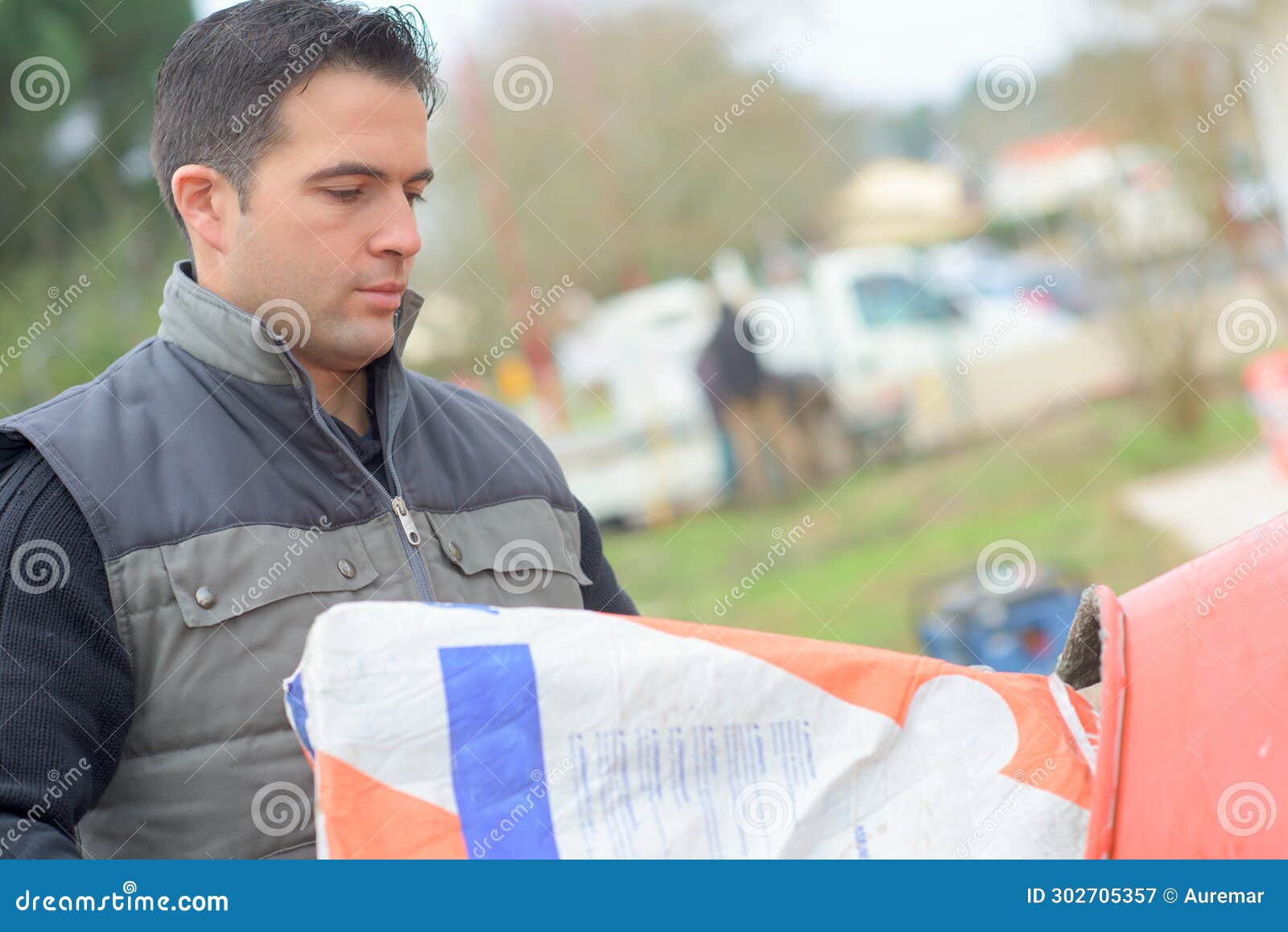 Man working cement mixer stock image. Image of cement - 302705357