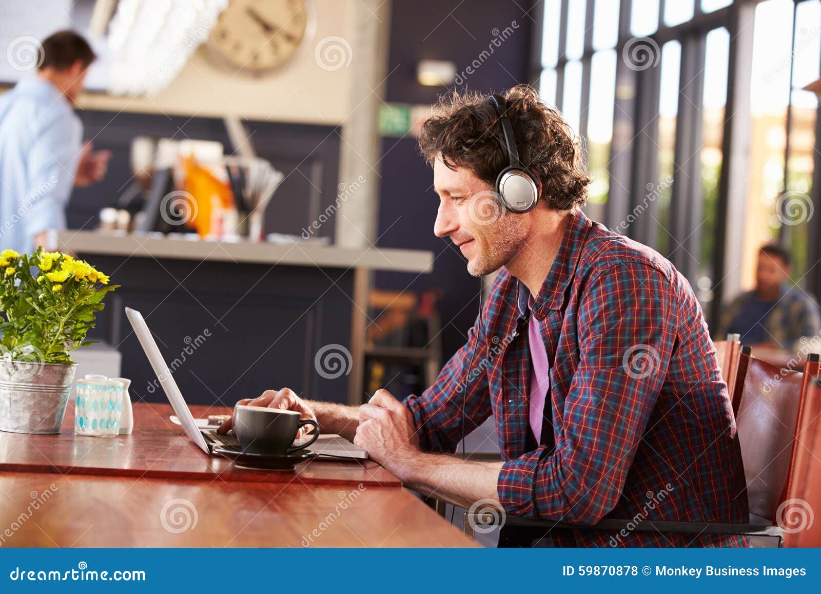 Man Working on Computer at Coffee Shop Stock Photo - Image of enjoyment ...