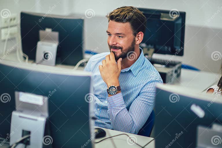 Man Working on Computer in Computer Lab Stock Photo - Image of desk ...