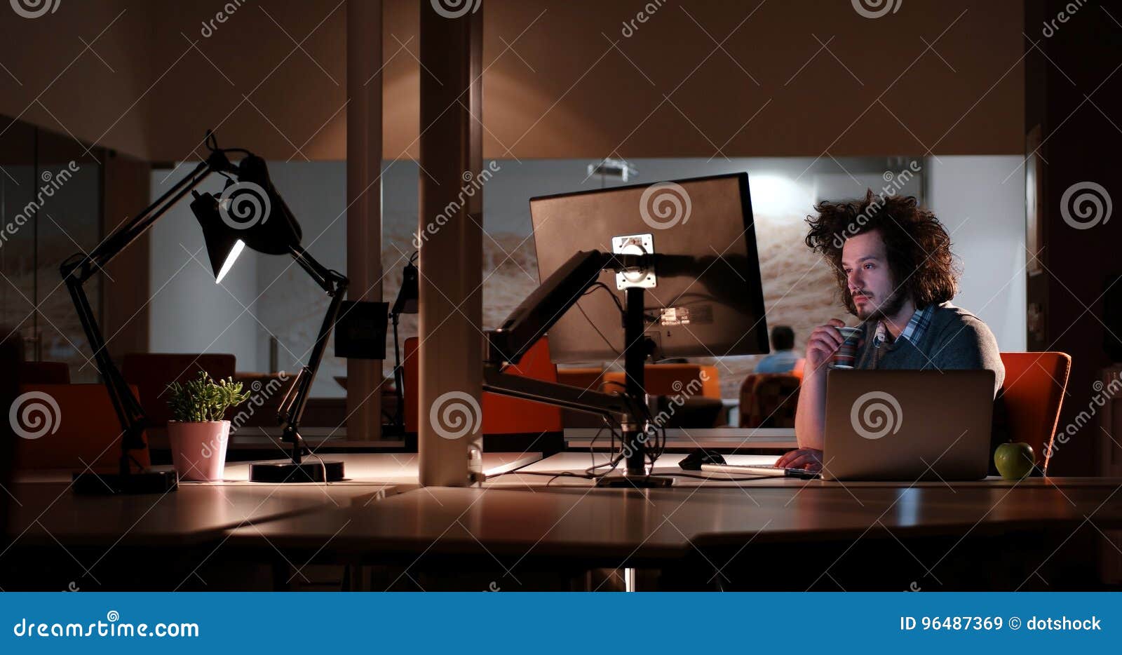 Man Working on Computer in Dark Office Stock Image - Image of business ...
