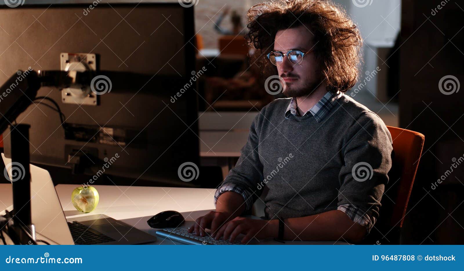 Man Working on Computer in Dark Office Stock Photo - Image of people ...