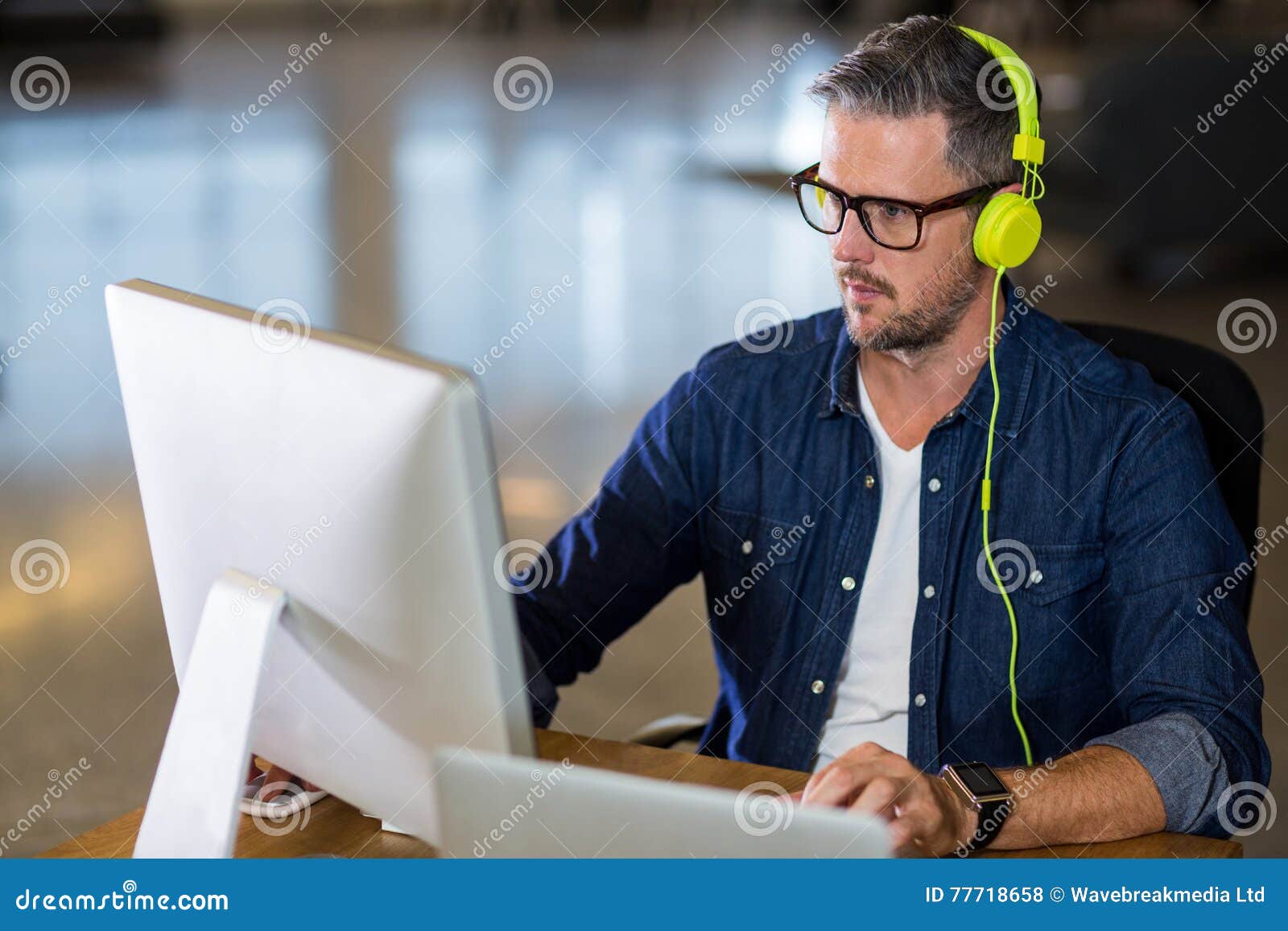 Man working on computer stock photo. Image of desk, eyeglasses - 77718658