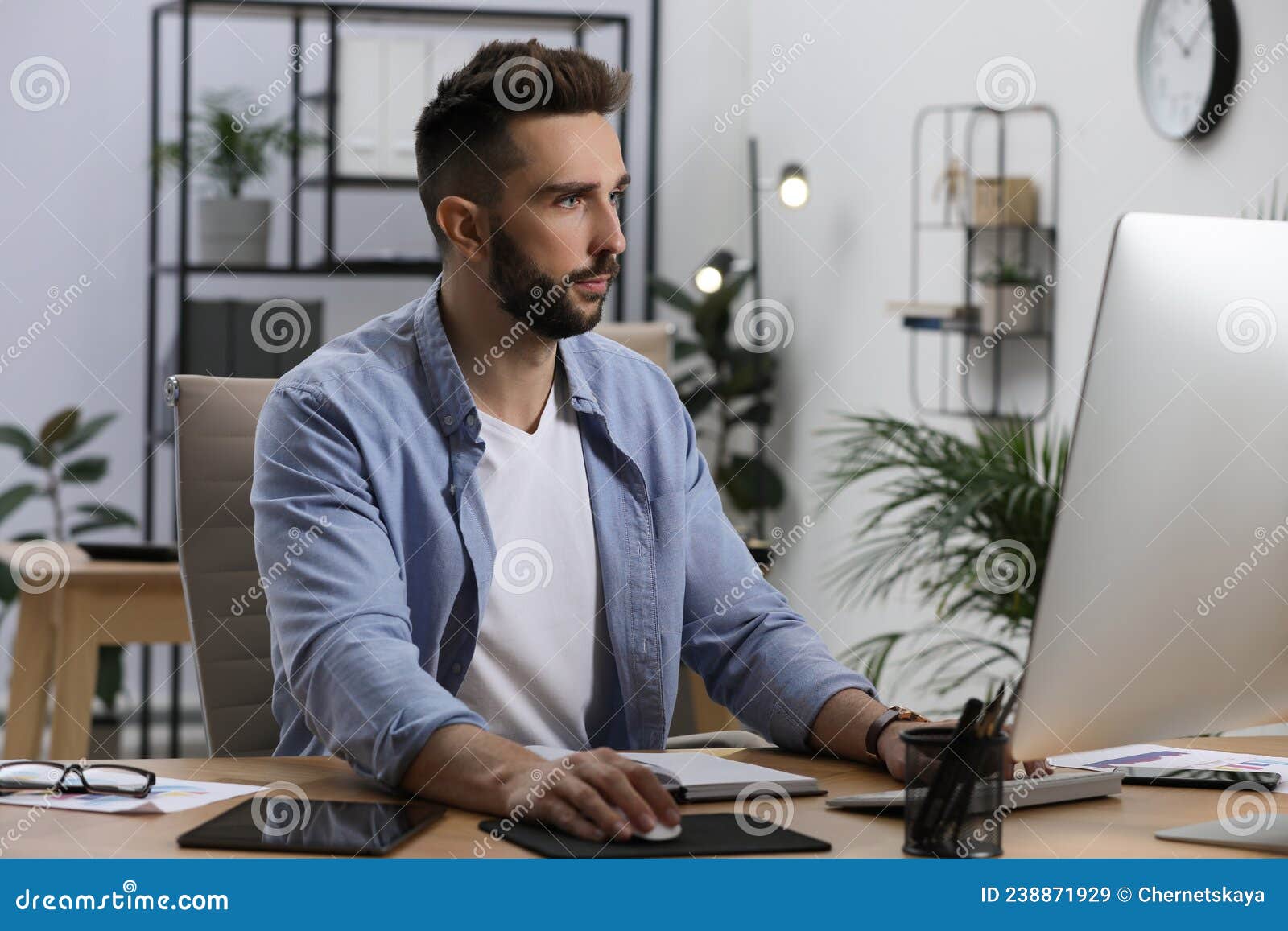 Man Working on Computer at Table in Office Stock Image - Image of busy ...