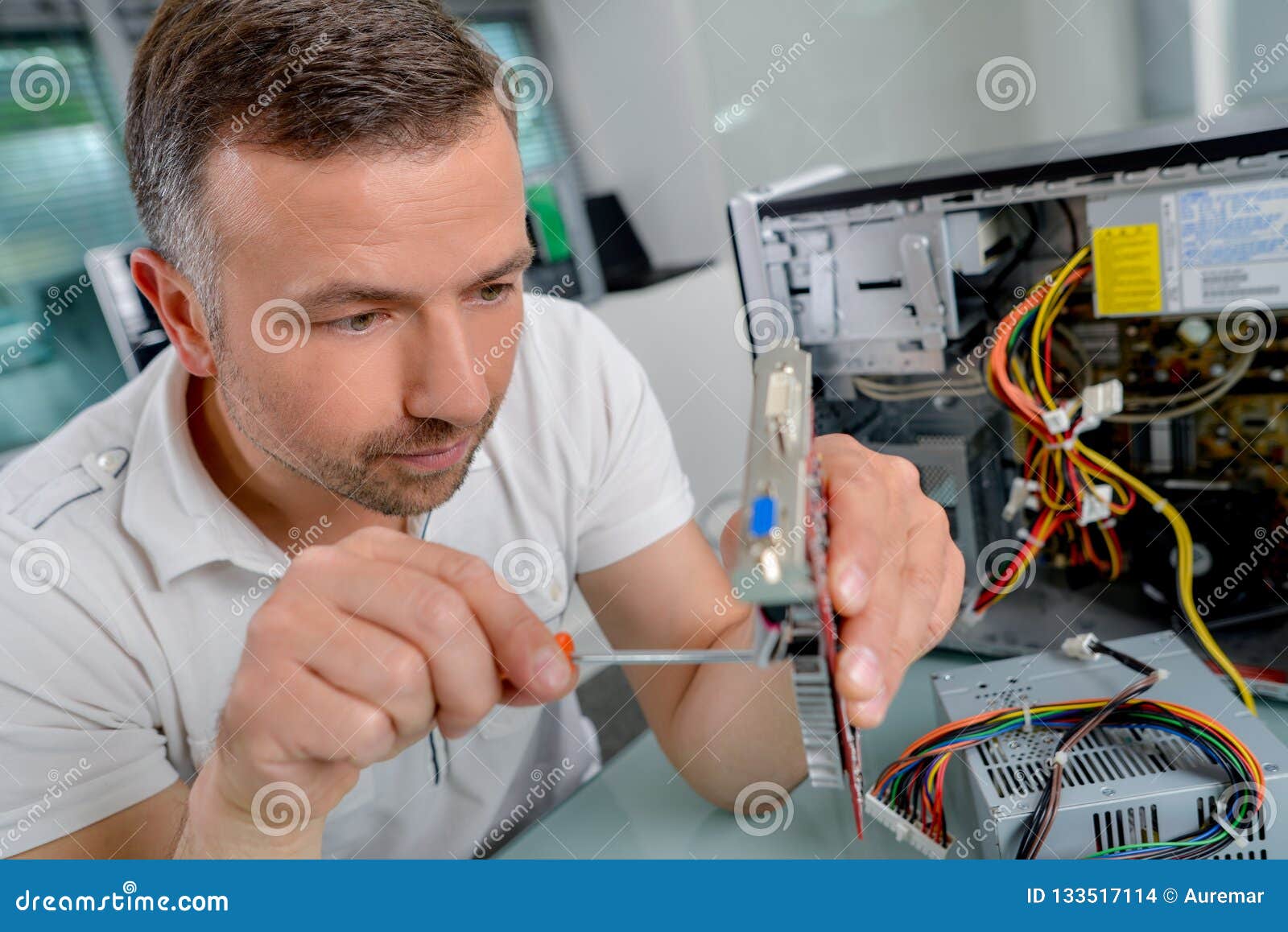 Man Working on Computer Using Screwdriver Stock Photo - Image of ...