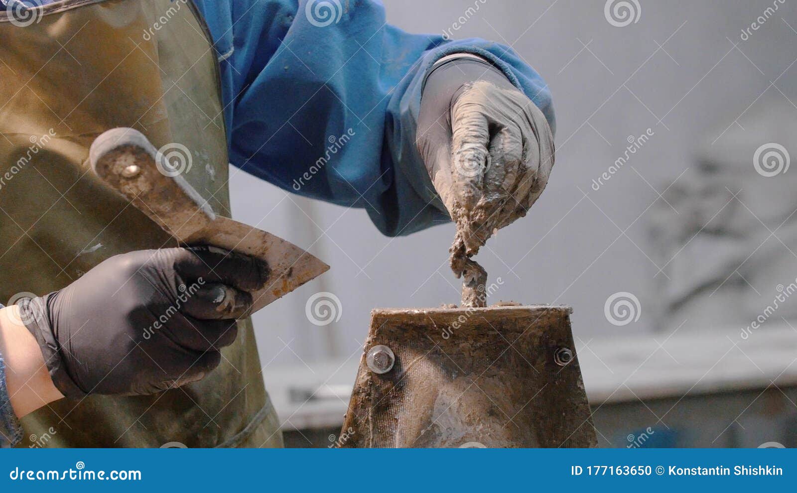 Man Working with a Concrete in the Workshop - Working with a Concrete ...