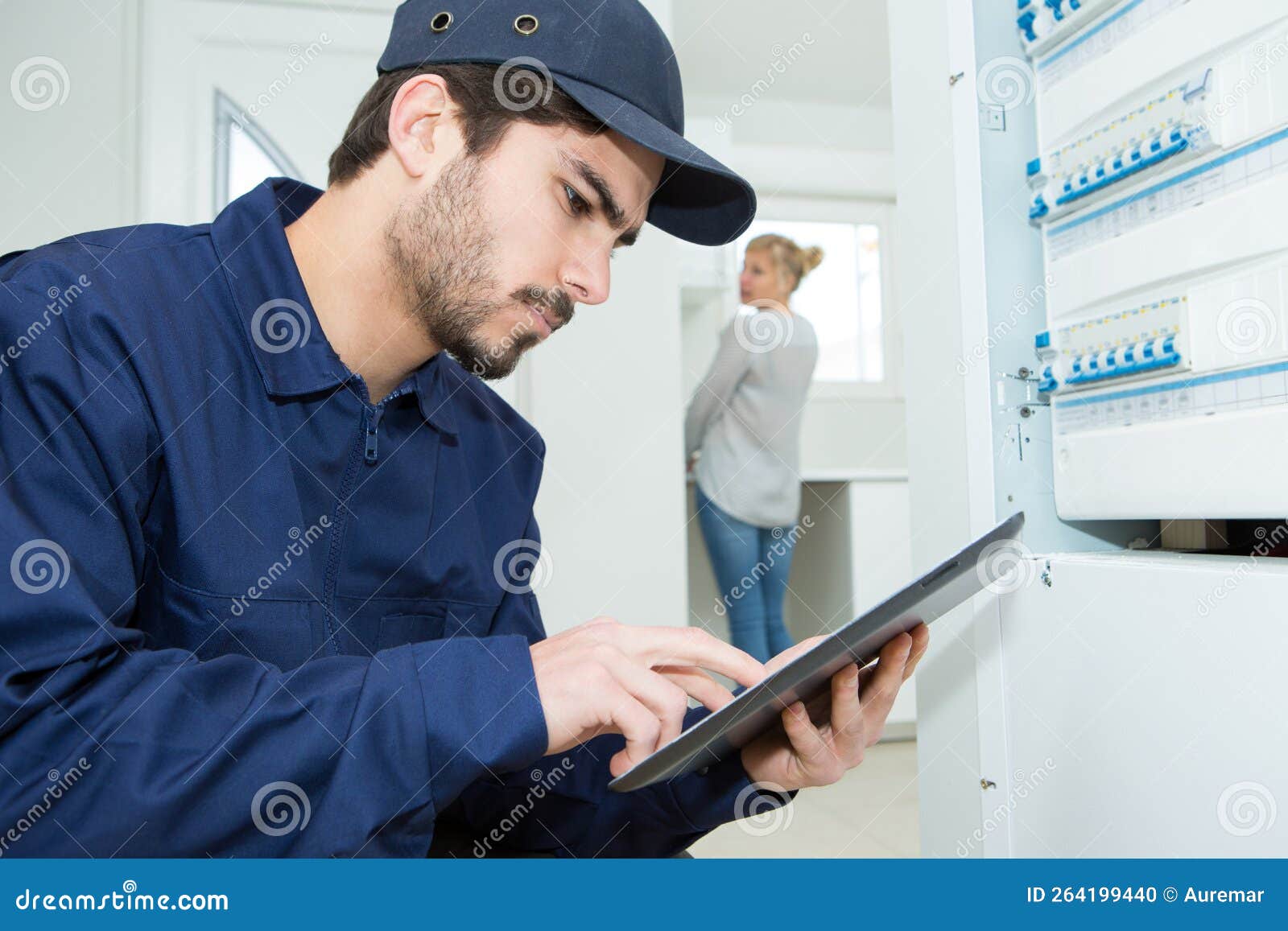 Man working on control box stock photo. Image of fuse - 264199440