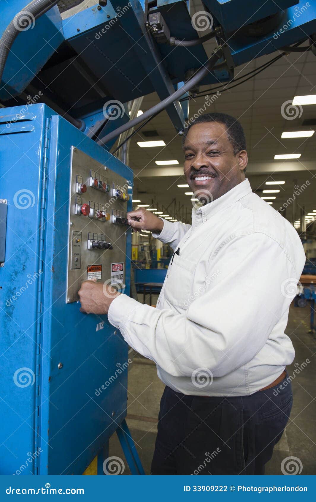 Man Working on Control Panel in Factory Stock Photo - Image of cheerful ...