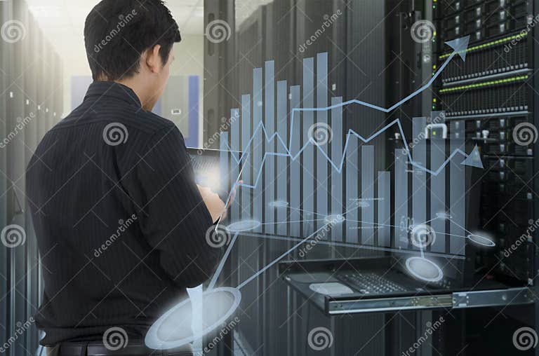 Man Working in Data Center and Use Tablet for Analyze System Stock ...
