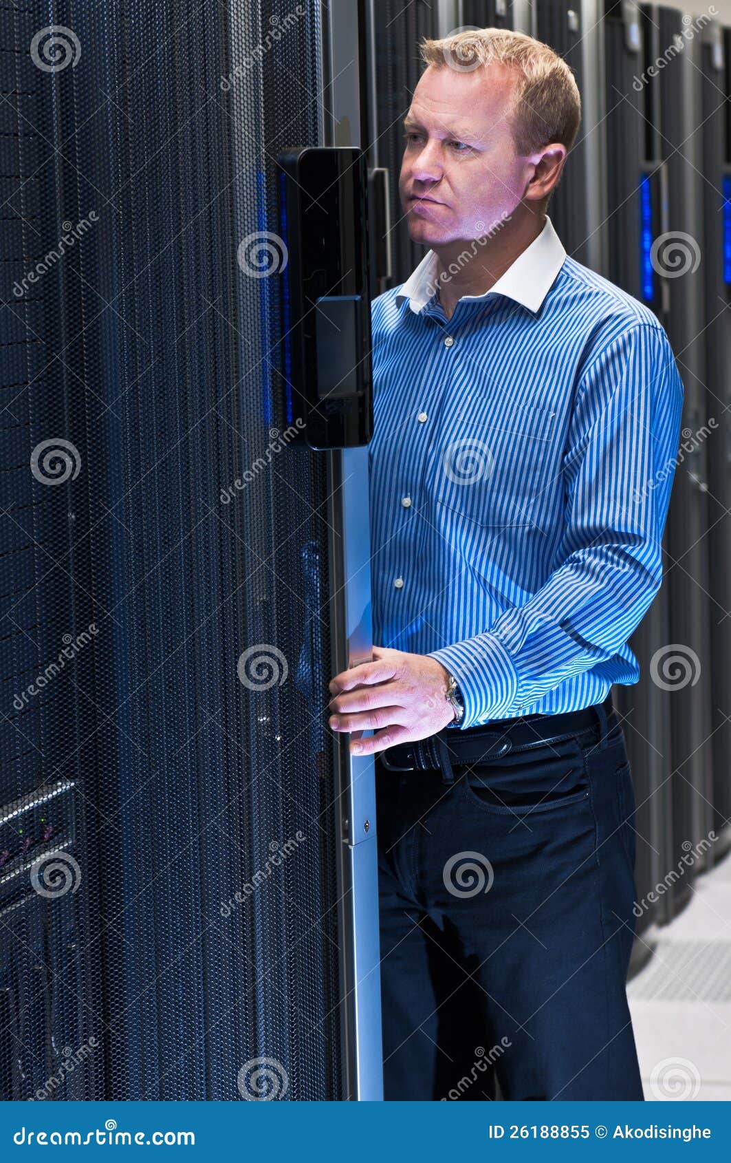 Man working in datacenter stock image. Image of information - 26188855