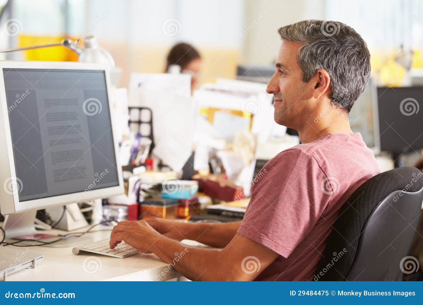 Man Working at Desk in Busy Creative Office Stock Image - Image of male ...