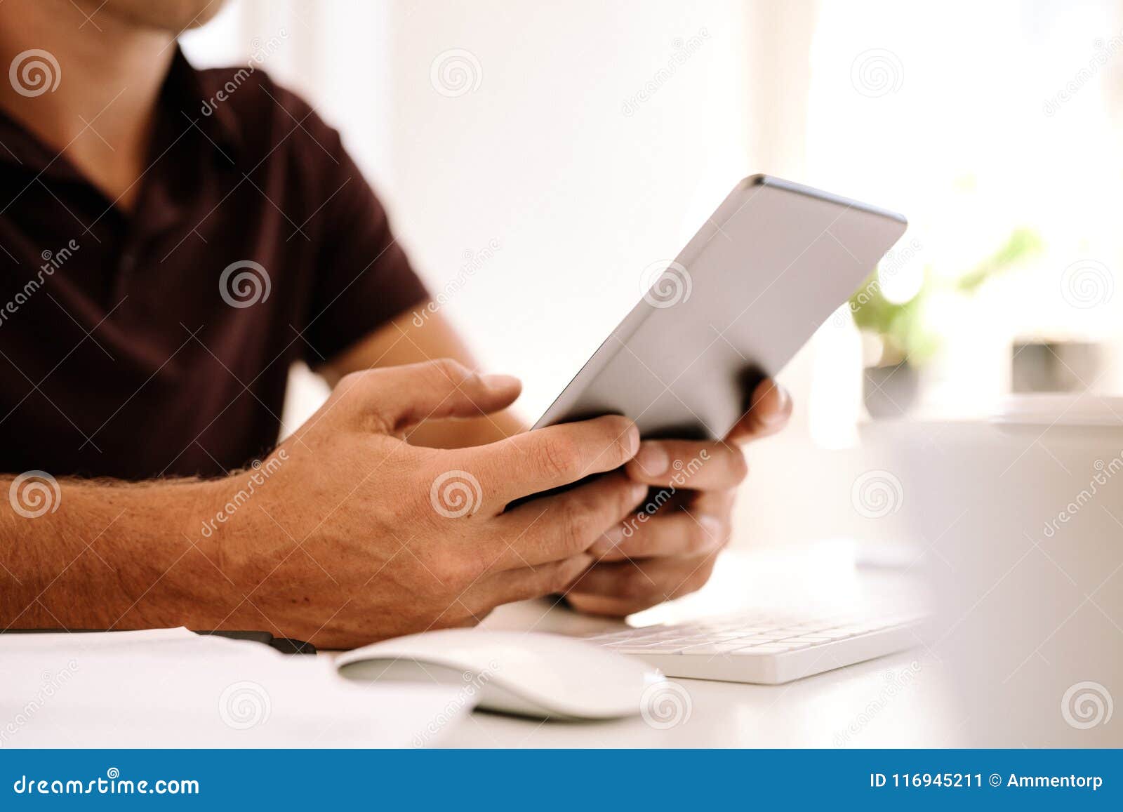 Man Working on Digital Tablet Sitting at Work Table Stock Image - Image ...