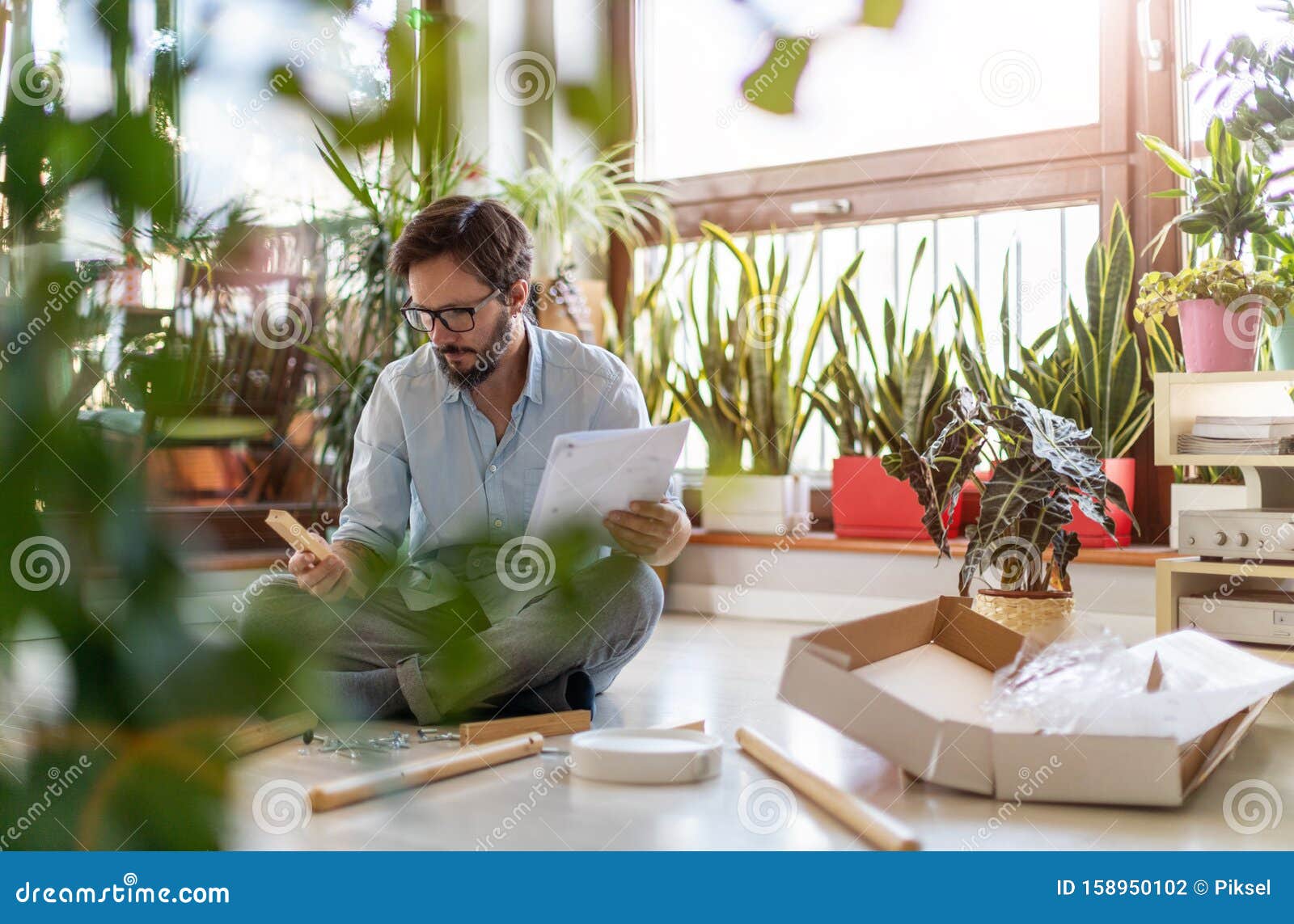 Man Working on a DIY Project at Home Stock Photo - Image of ...