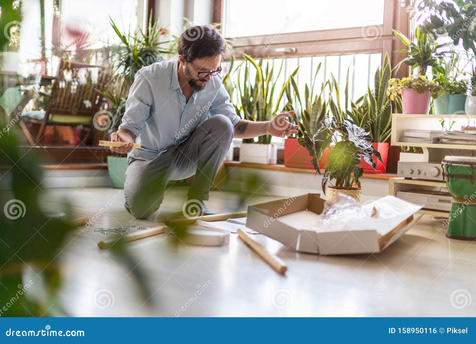 Man Working on a DIY Project at Home Stock Photo - Image of furniture ...