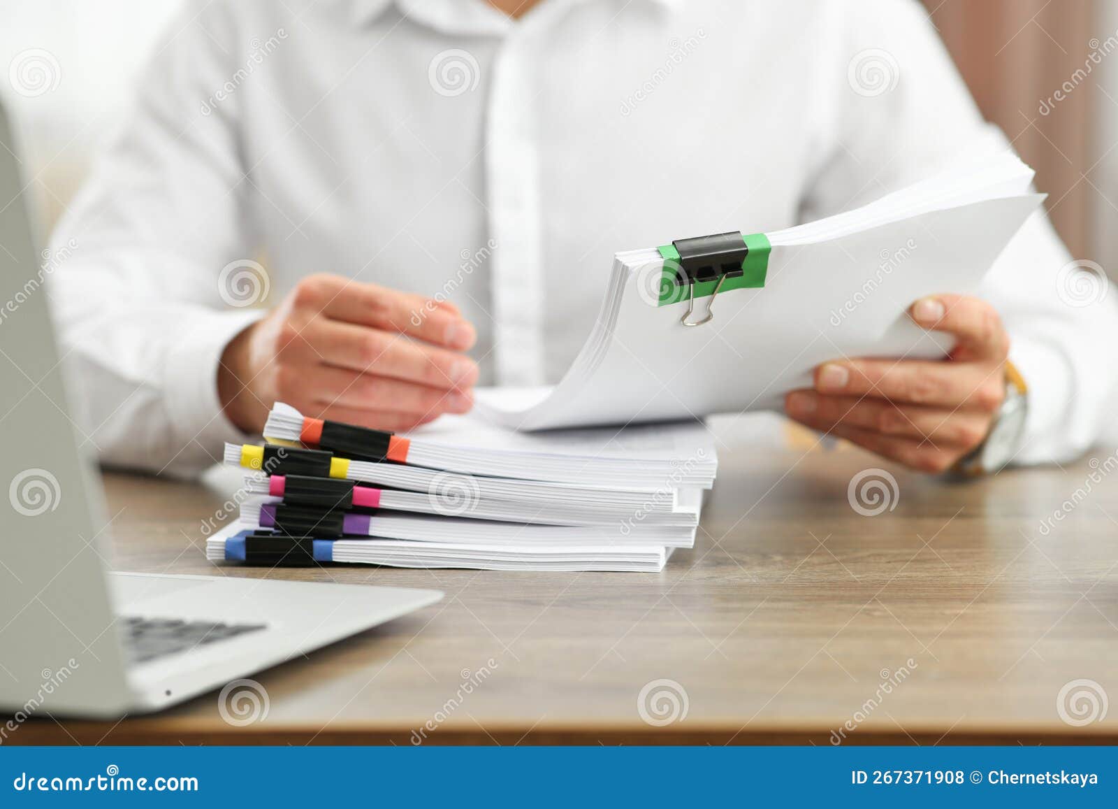 Man Working with Documents at Wooden Table in Office, Closeup Stock ...