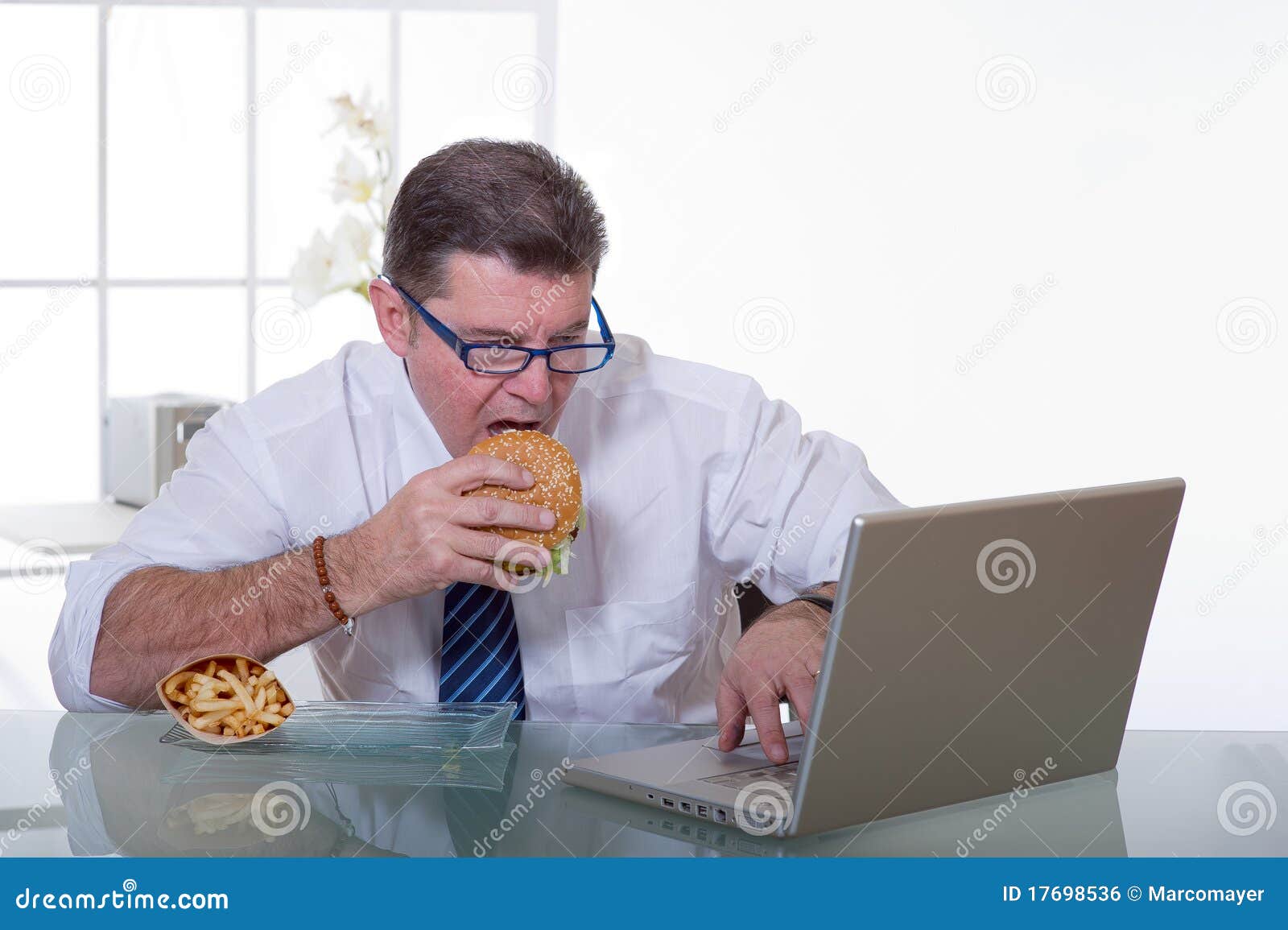 Man Working and Eat Unhealt Food Stock Photo - Image of adult, doubt ...