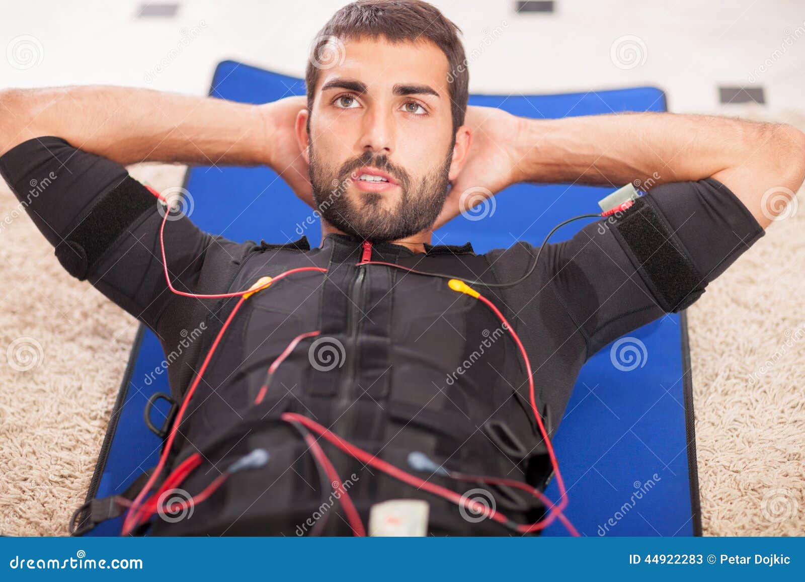 Man Working on Electro Muscular Stimulation Machine Stock Image - Image ...