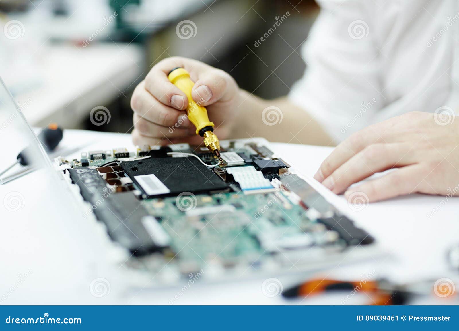 Man Working on Electronics stock image. Image of components - 89039461