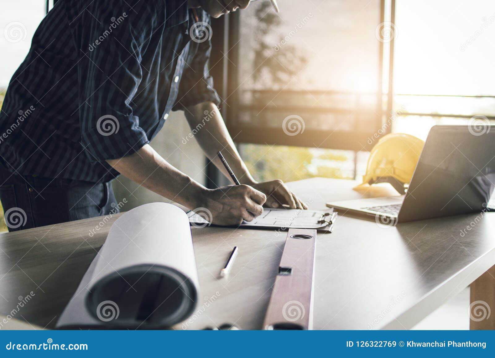 Man Working, Engineering Checking, Writing on Blueprint and Look Stock ...