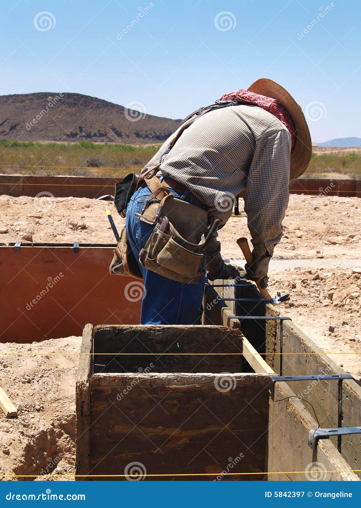 Man Working on Excavation Site - Vertical Stock Image - Image of ...