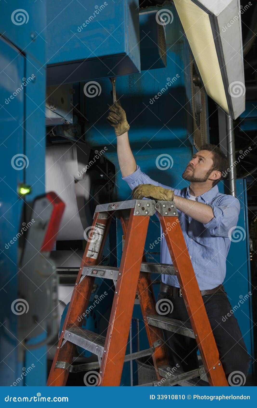 Man Working in Factory stock photo. Image of occupation - 33910810