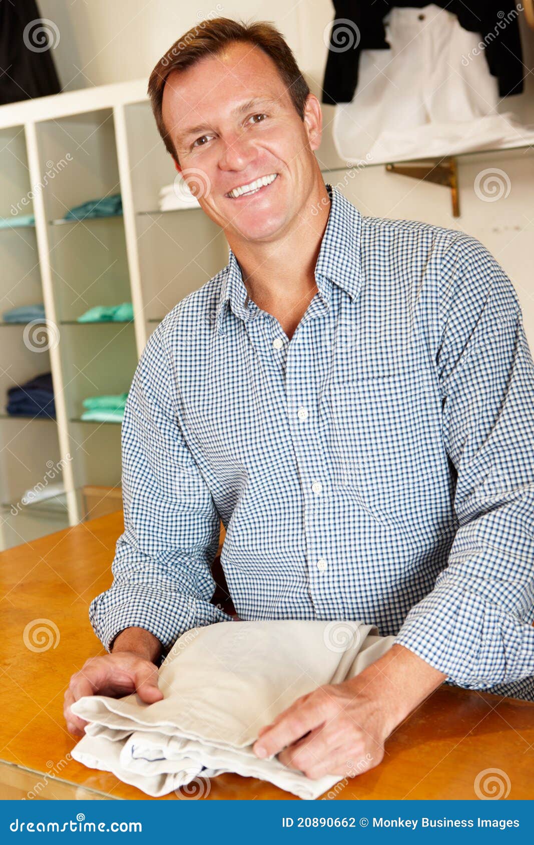 Man Working in Fashion Store Stock Photo - Image of retail, retailer ...