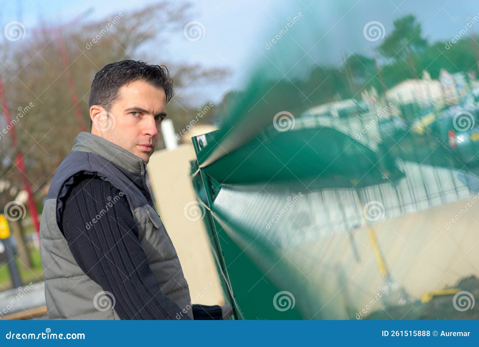 Man working on fence stock photo. Image of homework - 261515888