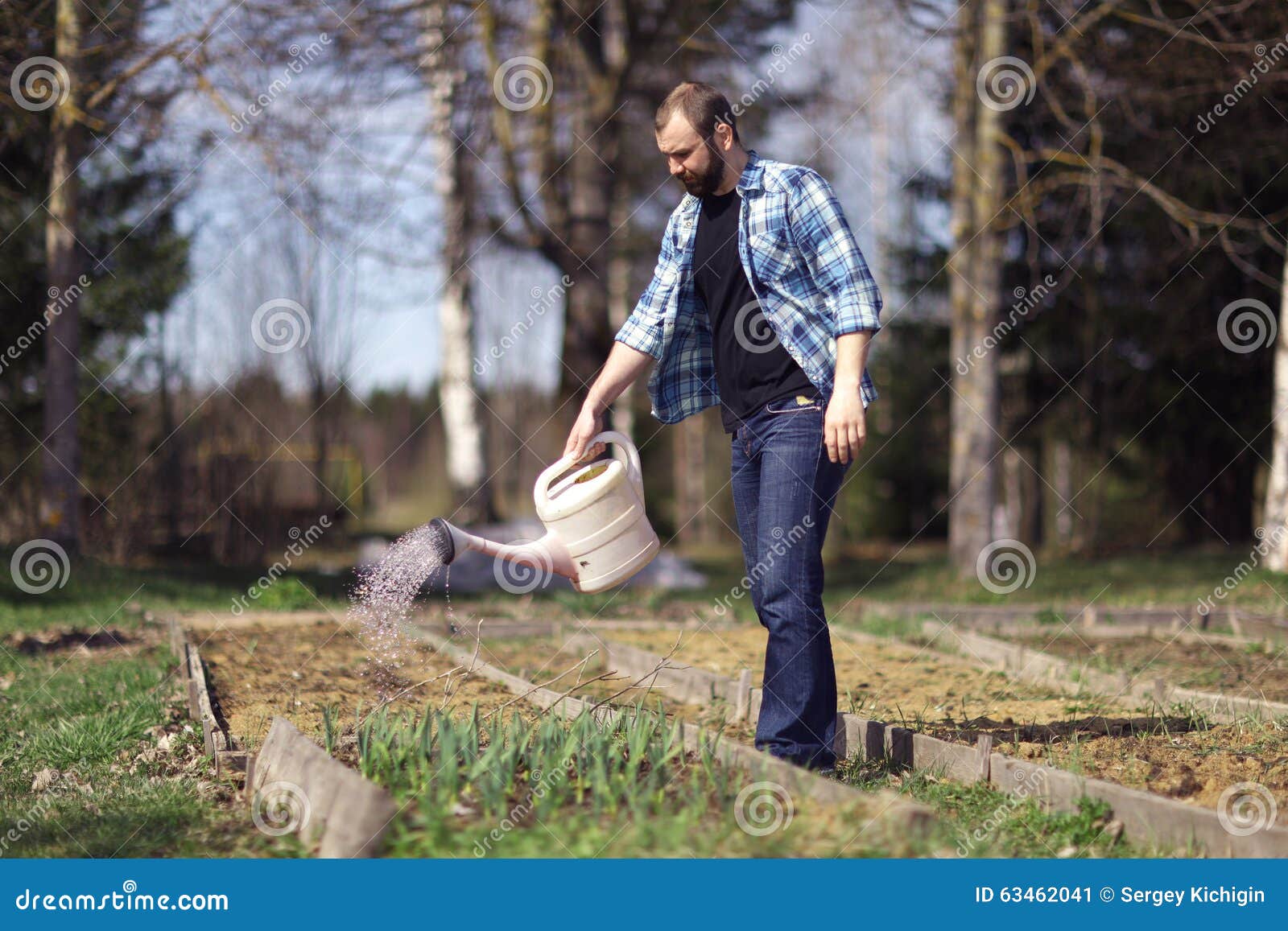 Man working in garden stock image. Image of outside, horticulture ...
