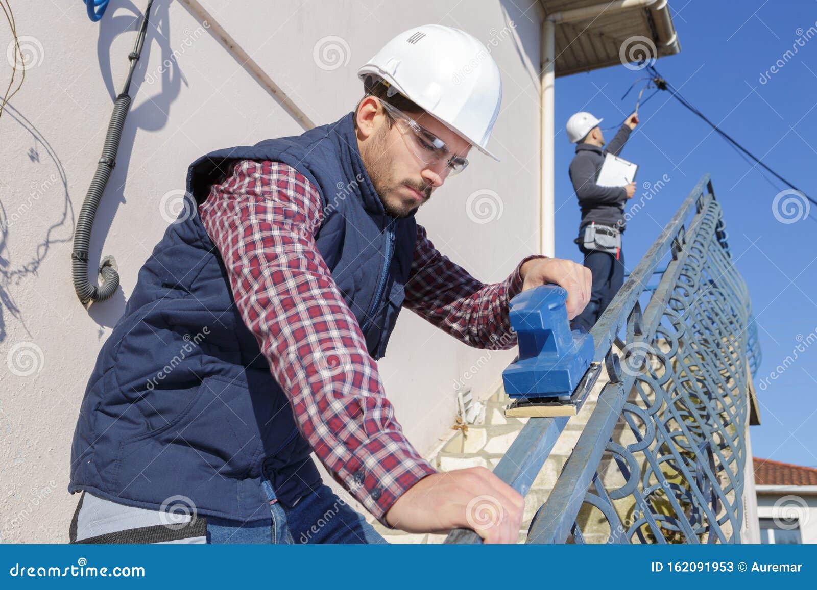 Man Working with Grinder Outdoors Stock Image - Image of circle, hone ...