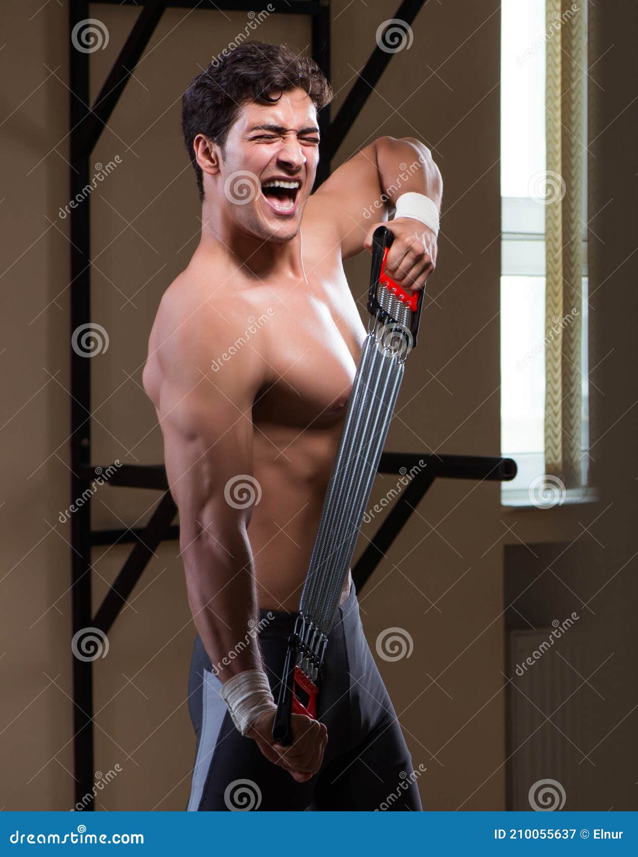 Man Working in the Gym with Springs Stock Image - Image of recreation ...