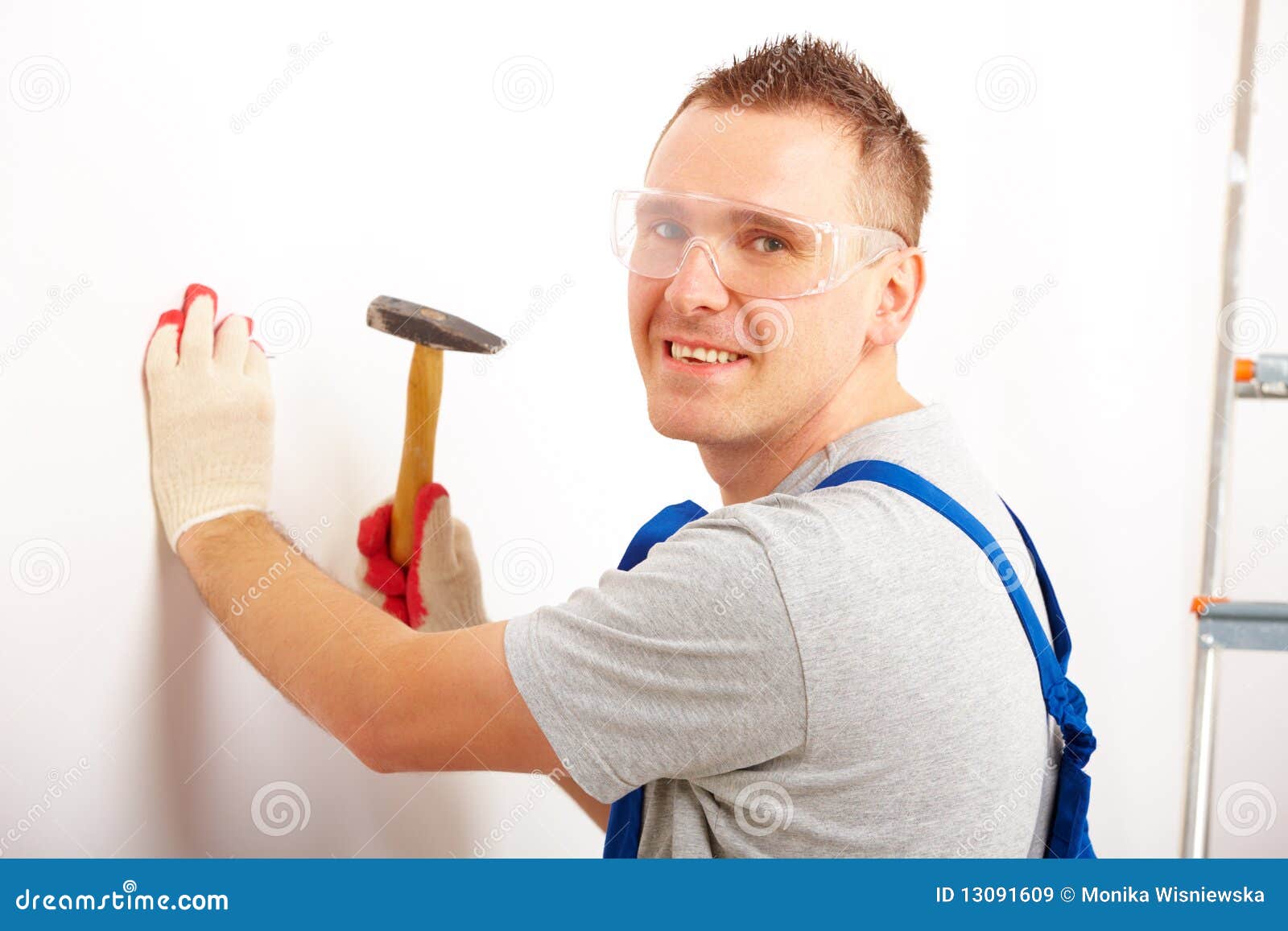 Man working with hammer stock image. Image of male, builder - 13091609