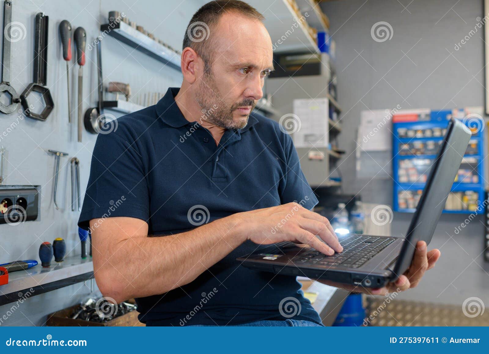 Man Working Hard in Tool Room Stock Image - Image of supply, items ...