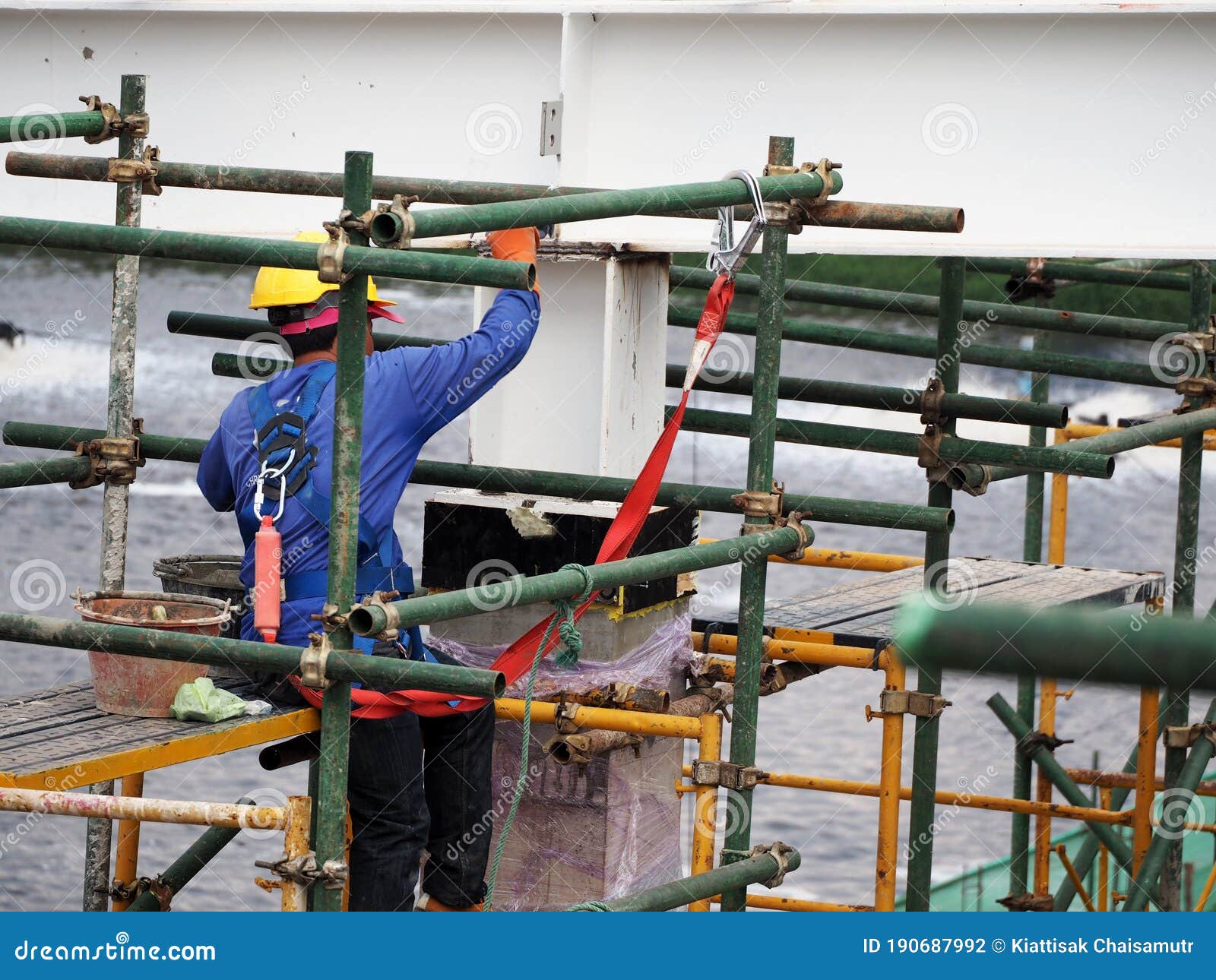Man Working on the Working at Height on Construction Stock Photo ...