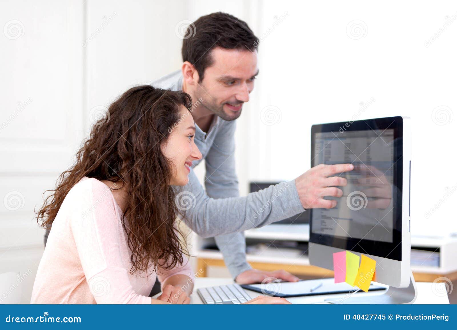 Man Working His Co Worker Computer Stock Photos - Free & Royalty-Free ...