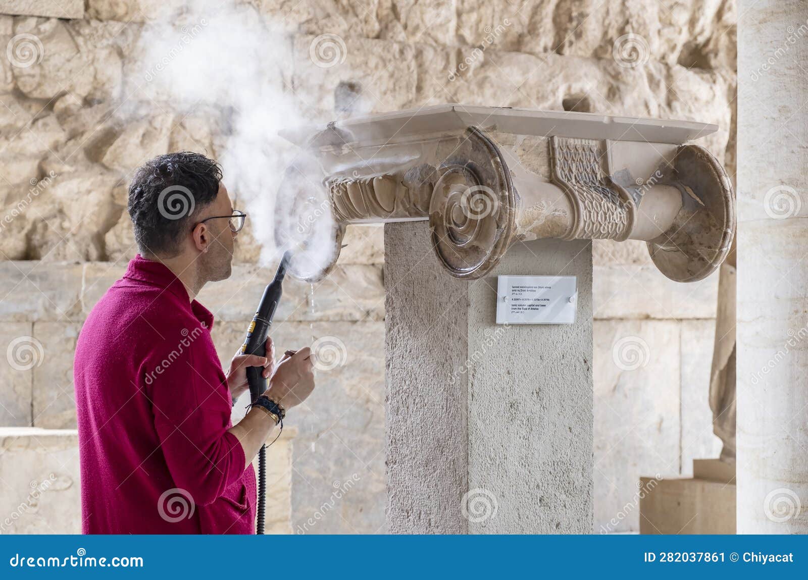 Man Working with His Tools To Restore an Ionic Column Editorial Photo ...