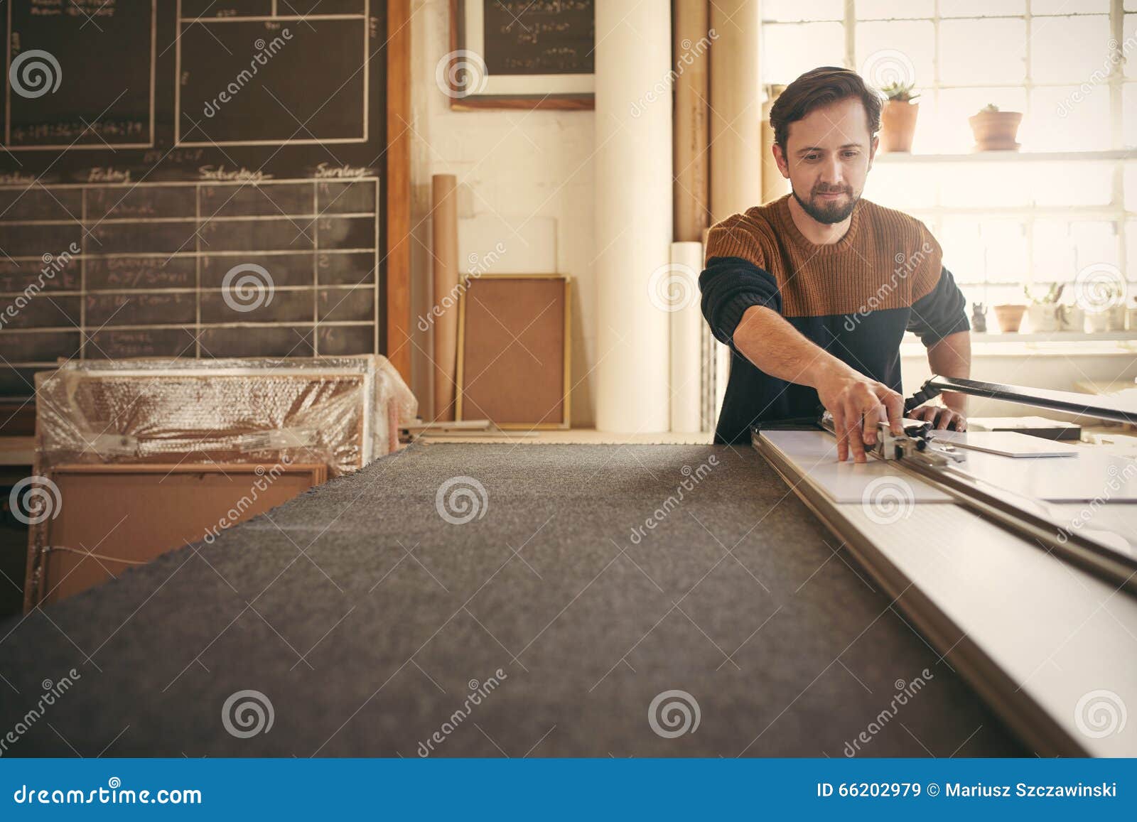 Man Working at His Workbench with Concentration Stock Image - Image of ...
