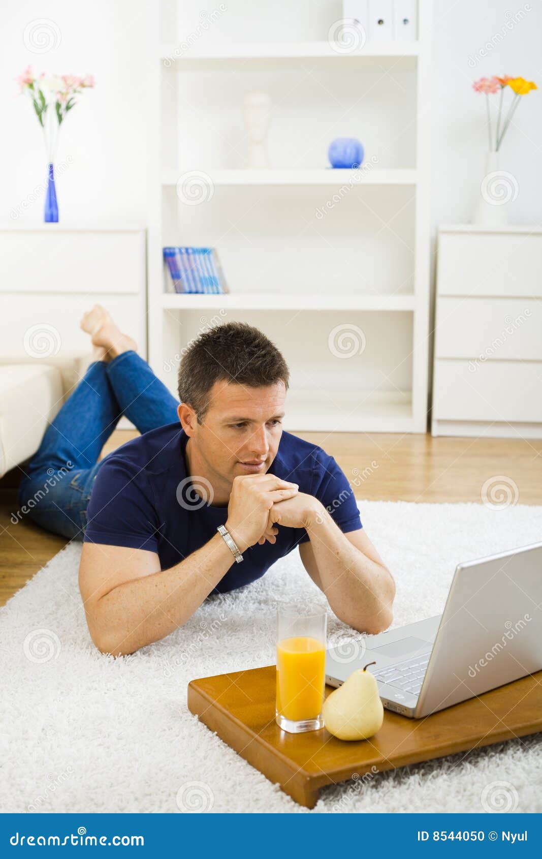 Man working at home stock photo. Image of looking, floor - 8544050